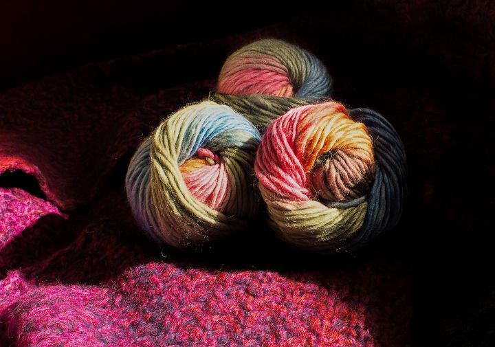 Skeins of colorful wool on black - helen geld - Photography, Still Life ...