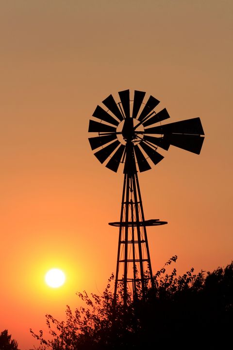 Kansas Windmill with an orange sky. - Robert D Brozek - Photography ...